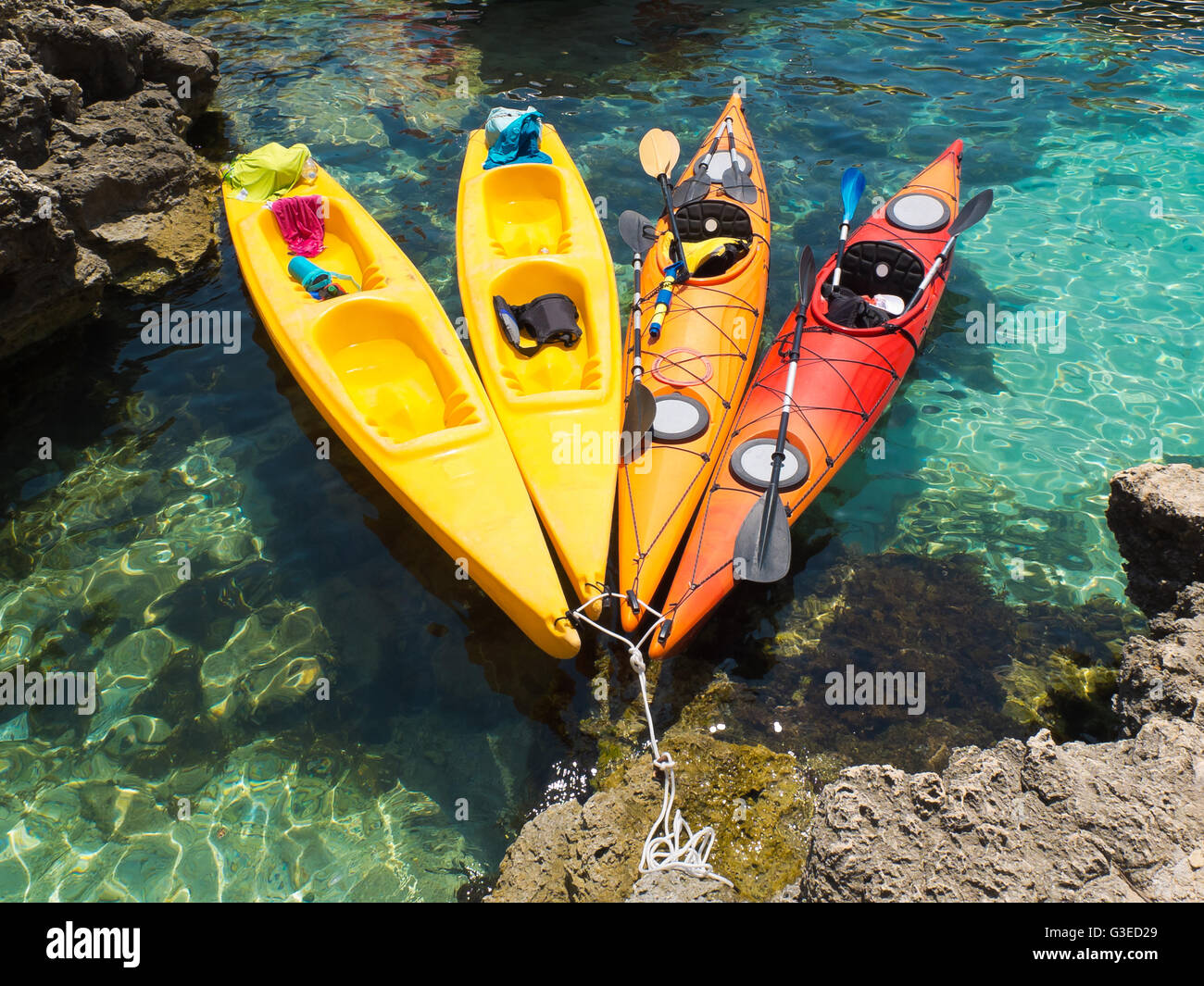 Orange canoes hi-res stock photography and images - Alamy