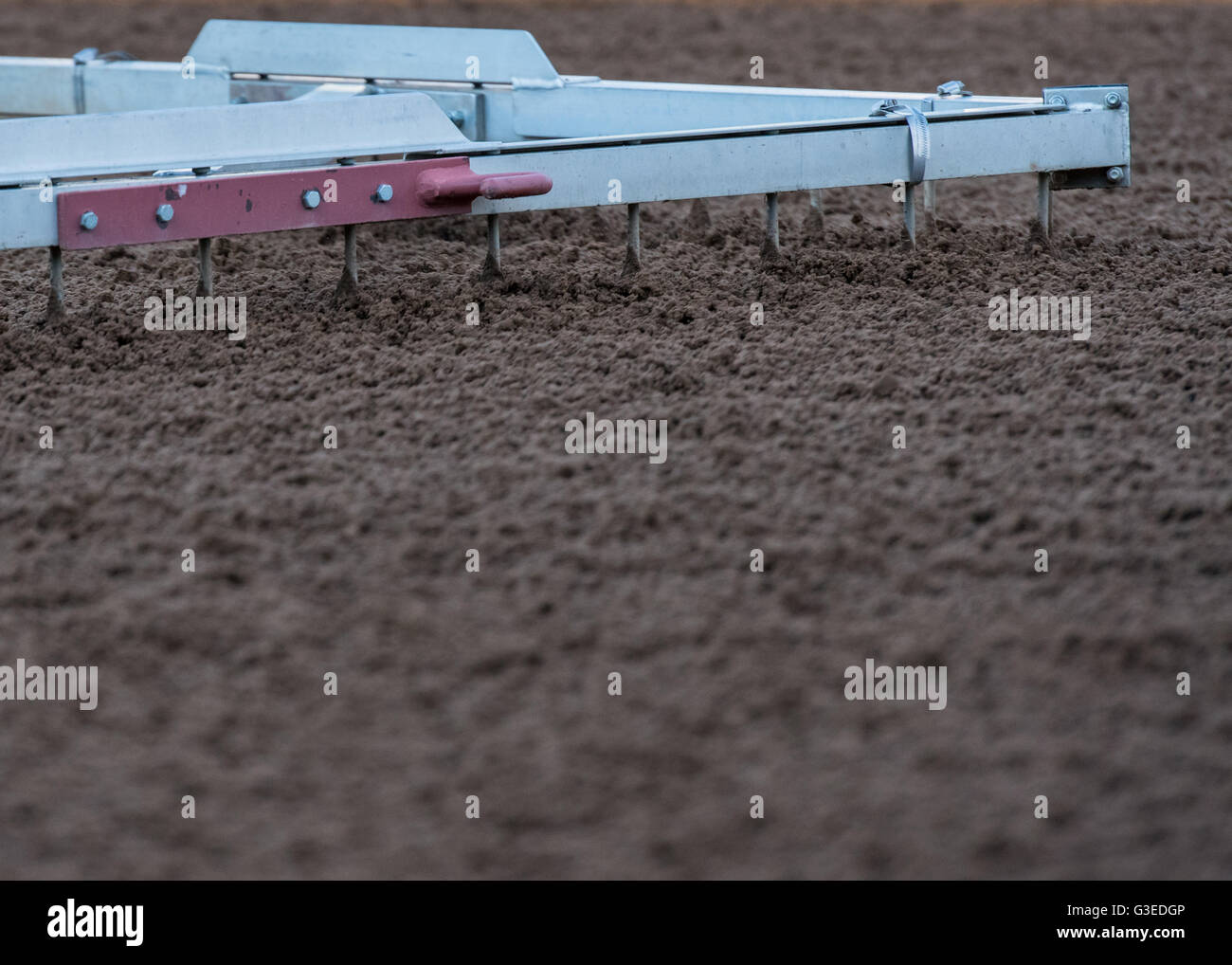 Side view of Track Harrow running along dirt track Stock Photo - Alamy