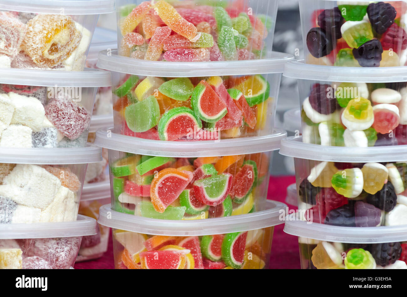 Candy in plastic containers on the market Stock Photo - Alamy