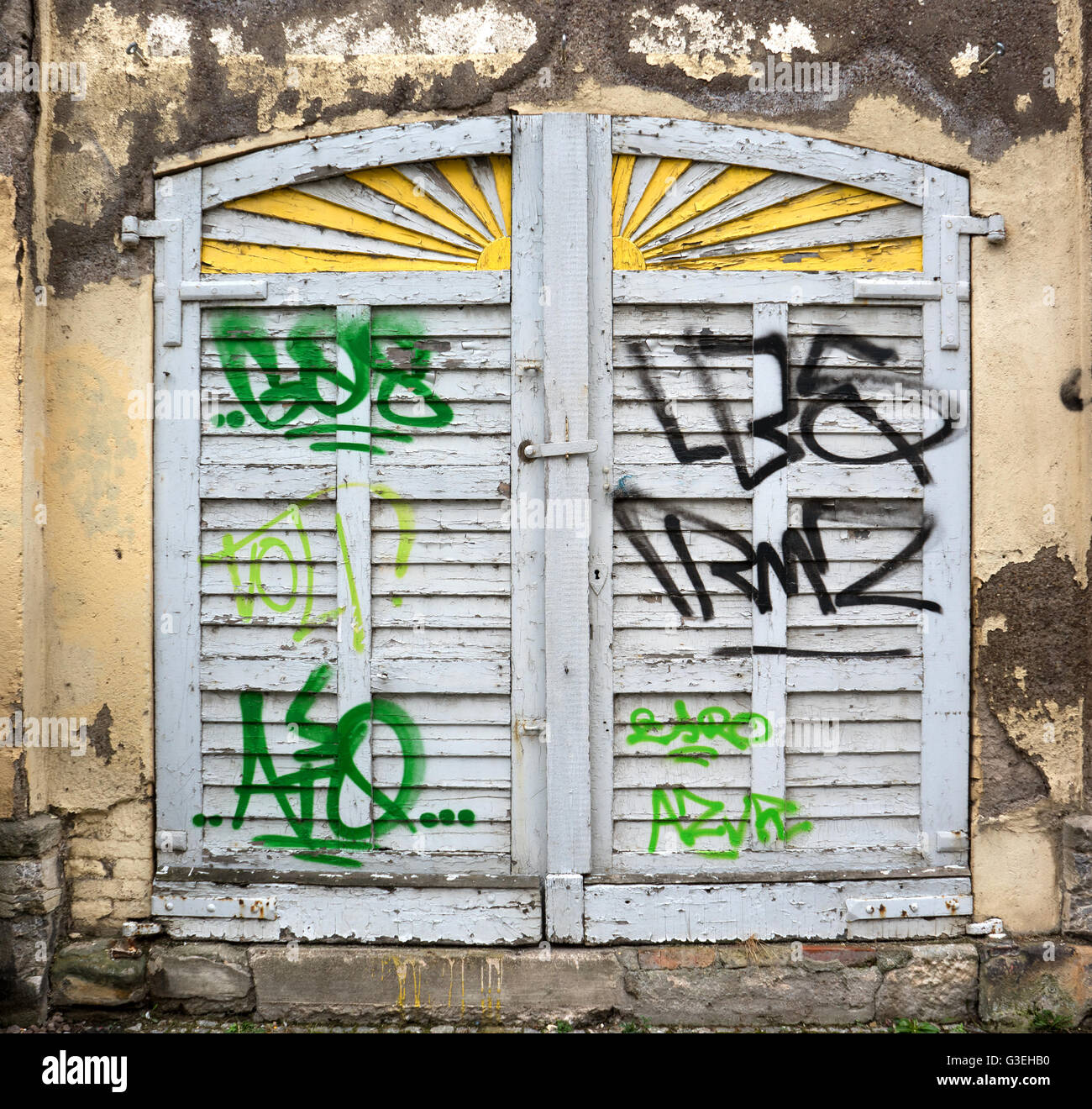 Smeared closed old window shutter Stock Photo - Alamy