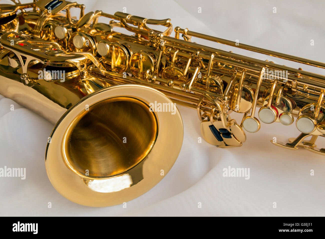 saxophone on delicate White silk Stock Photo - Alamy