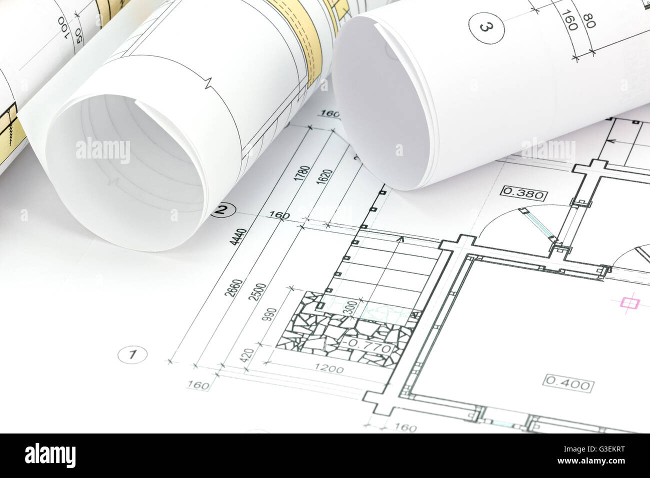 architect workspace with blueprint rolls and technical drawing Stock ...