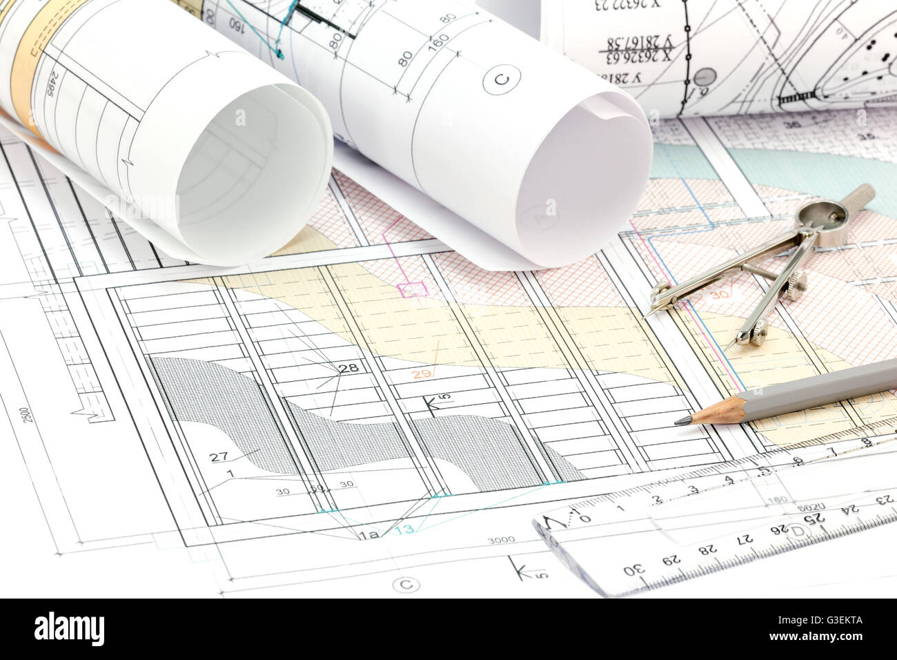 technical project drawings, rolls of blueprints and drawing tools Stock ...