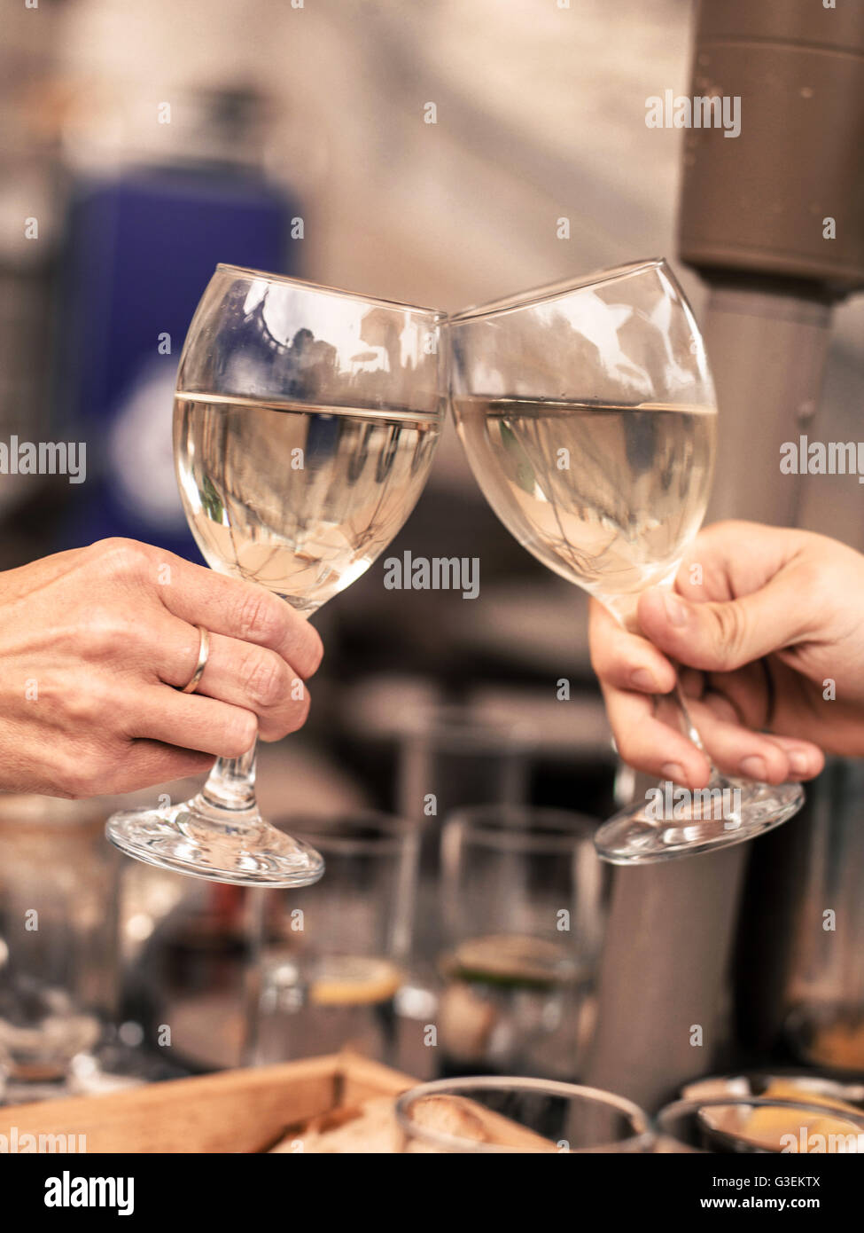 Two People Celebrating Success, By Toasting The Future, With Glasses Of ...