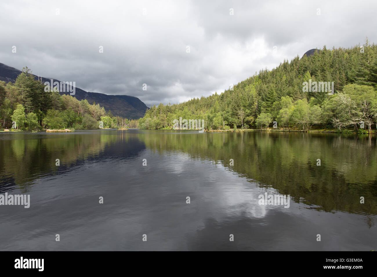 Village of Glencoe, Scotland. Glencoe Lochan, with the Pap of Glencoe ...
