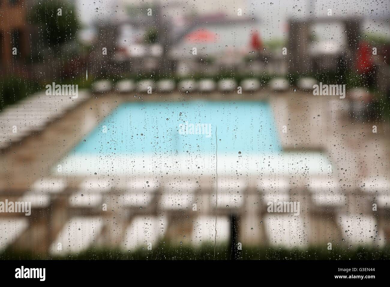 Rainy day at the pool Stock Photo - Alamy