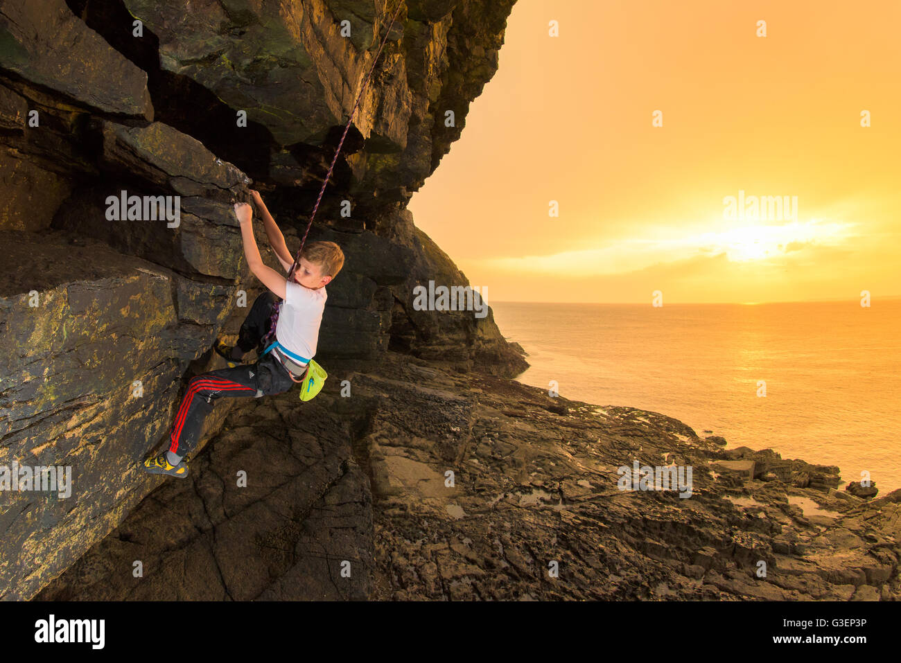 Rock Climbing at Ogmore Stock Photo - Alamy