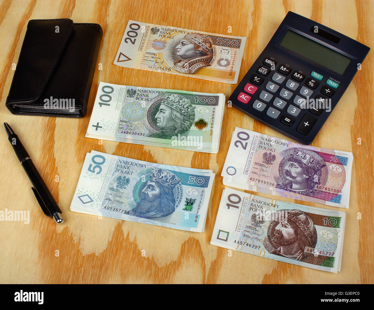 Polish money background calculator pen wallet Stock Photo - Alamy