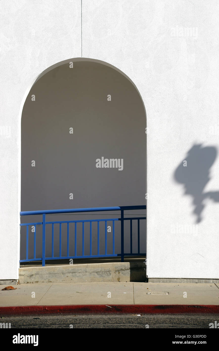 Open passage with arched windows Stock Photo - Alamy