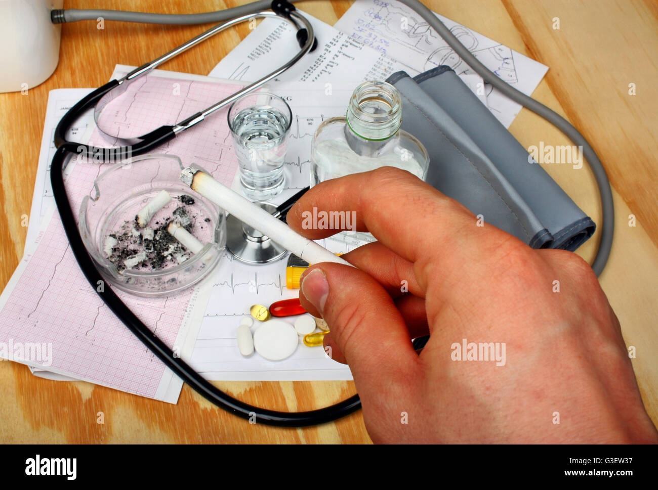 Man smoking a cigarette on a background of medical research Stock Photo ...