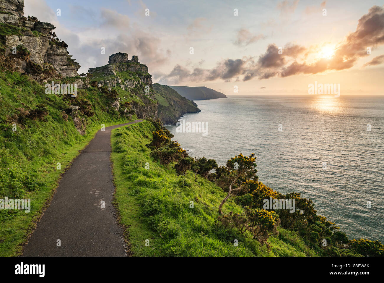 Beautiful sunset landscape image of Valley of The Rocks in Devon ...