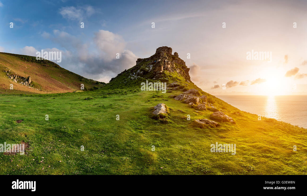Beautiful sunset landscape image of Valley of The Rocks in Devon ...