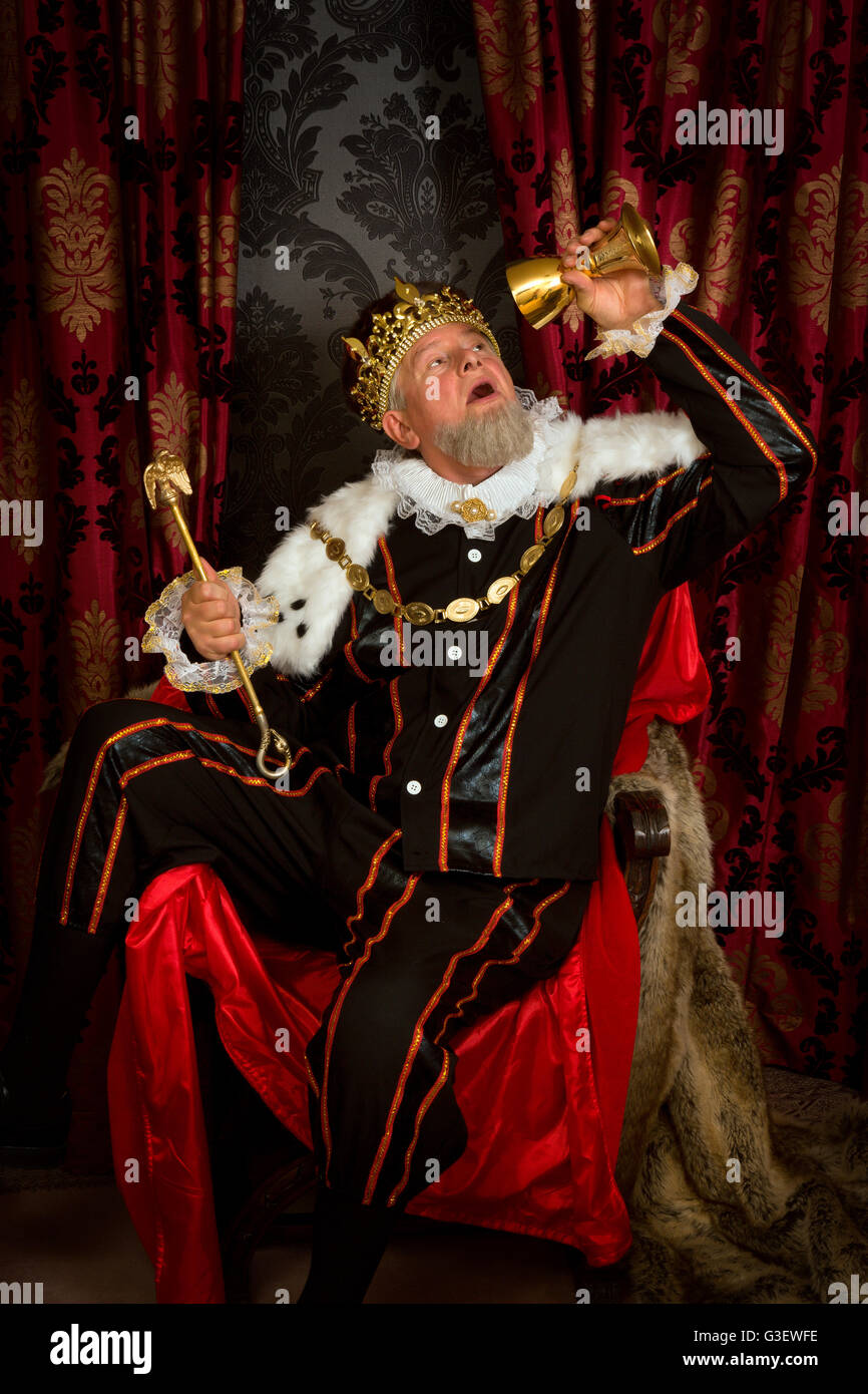 Holding a crown and a scepter hi-res stock photography and images - Alamy