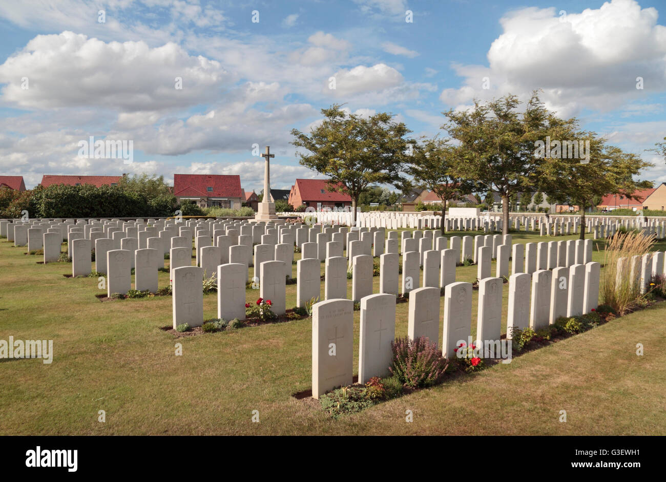 The Cross of Sacrifice and headstones in the CWGC Browns Road Military ...