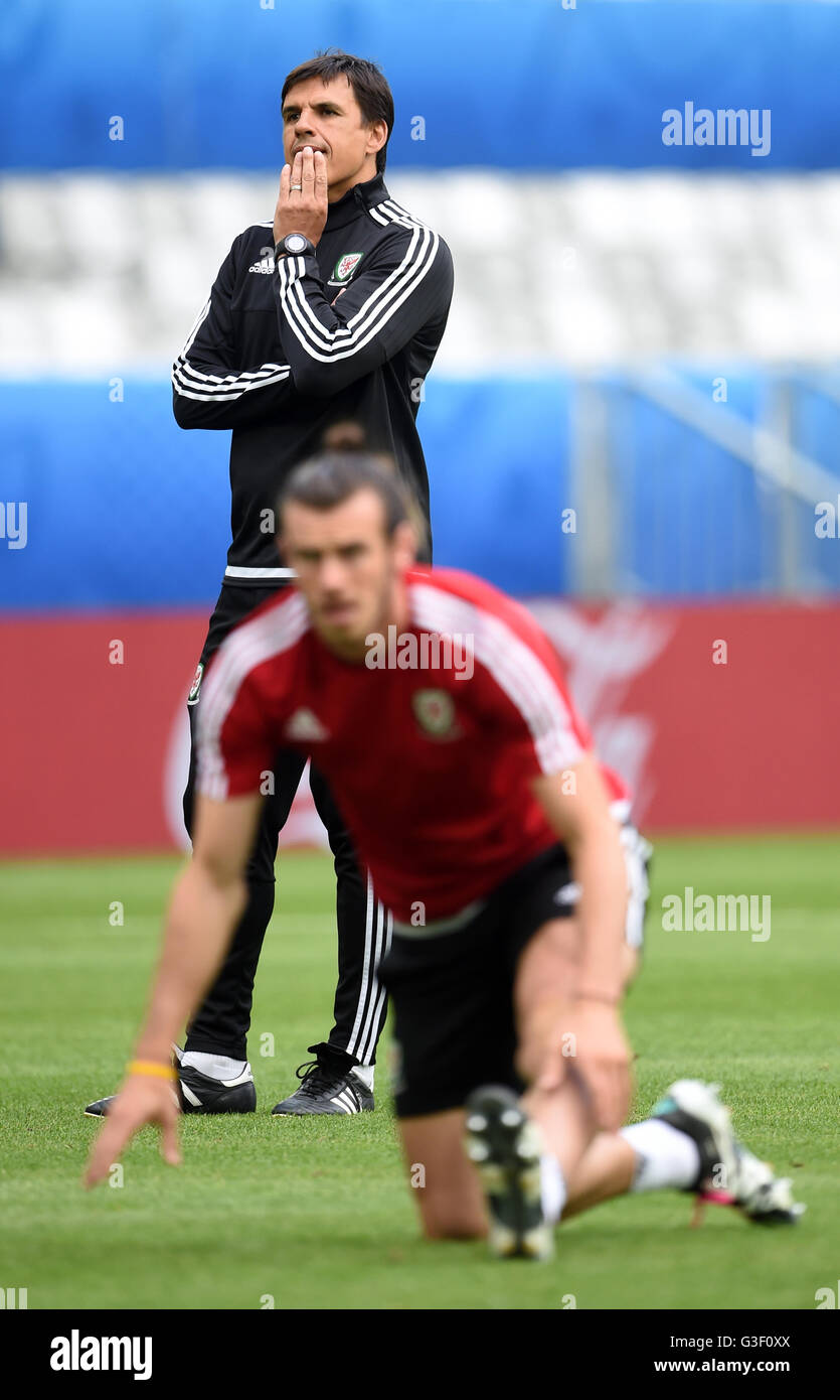 Wales' Gareth Bale (right) and manager Chris Coleman during a training ...