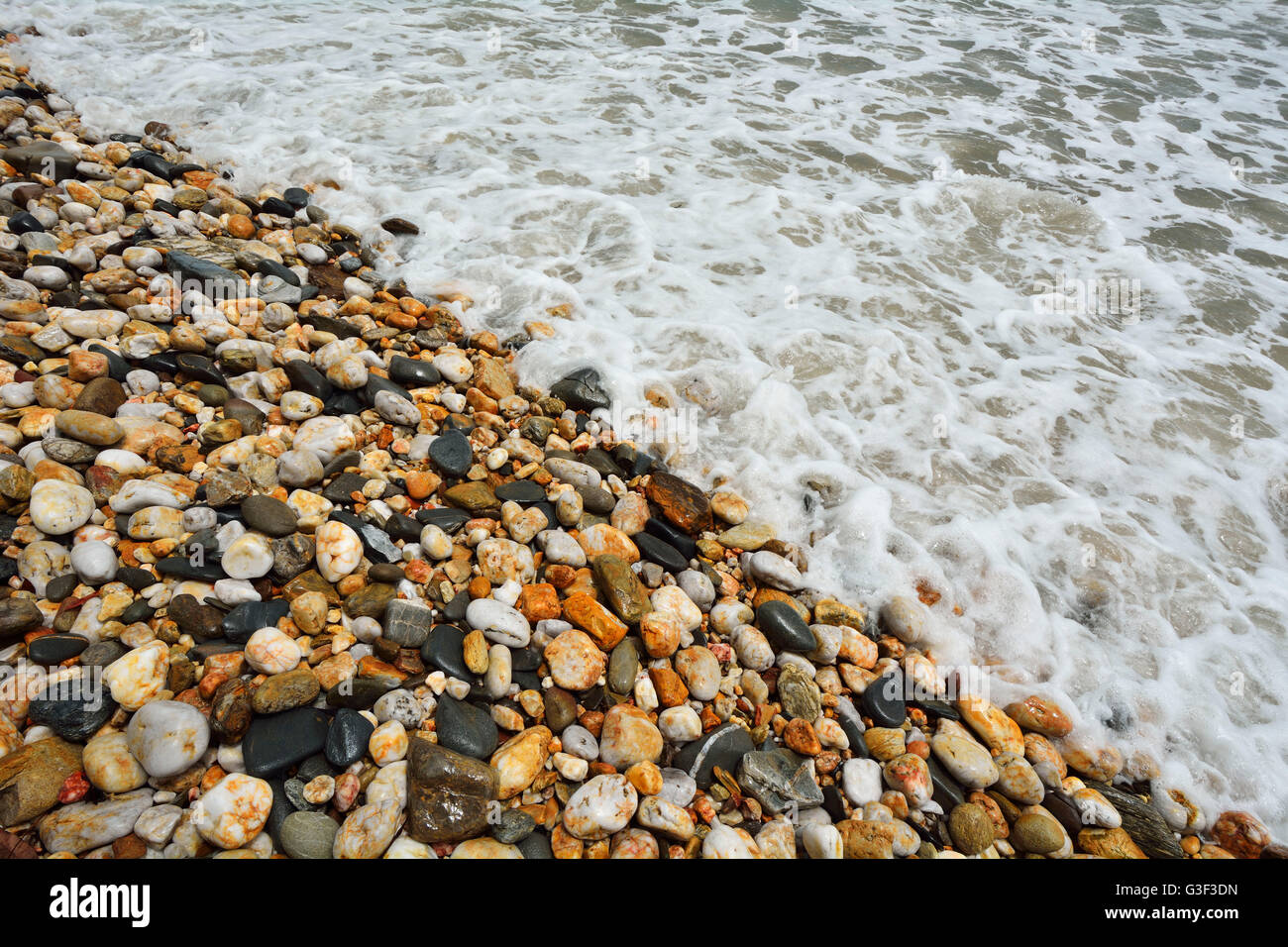 Pebble Beach with Seawater, Captain Cook Highway, Queensland, Australia ...