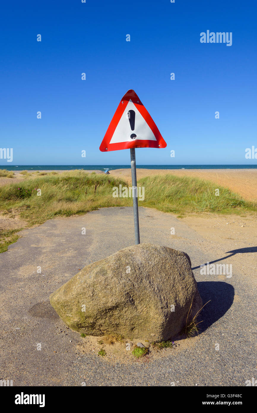 Deformed warning sign on beach hi-res stock photography and images - Alamy