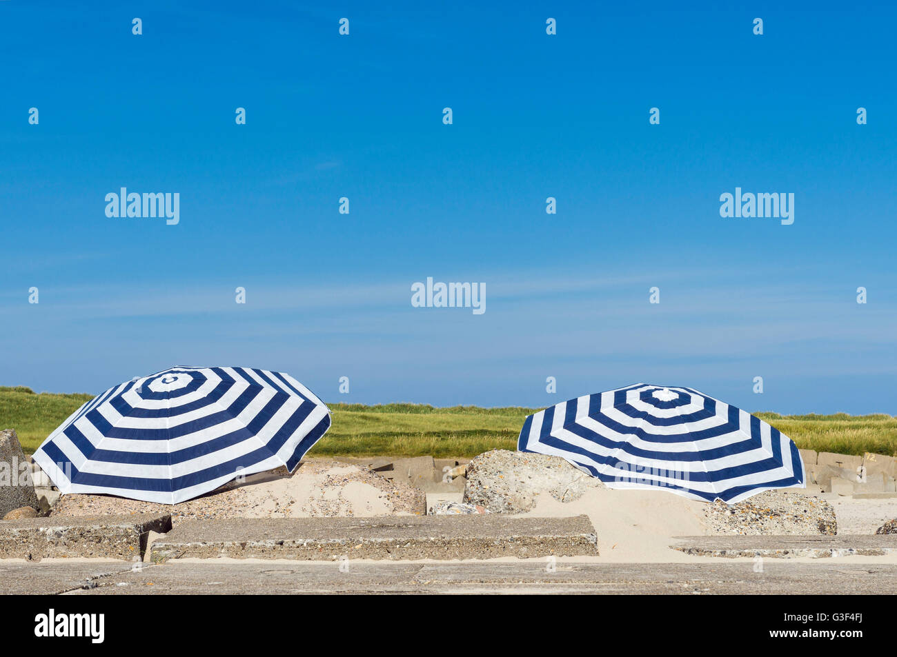Two Parasol on Concrete Mole, Summer, Thyborøn, Midtjylland, Denmark ...
