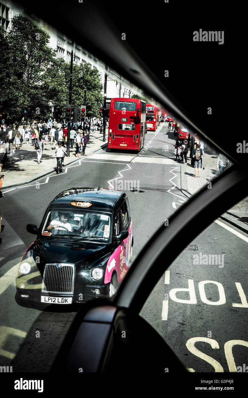 Public transport in a street in London, England, United Kingdom Stock ...