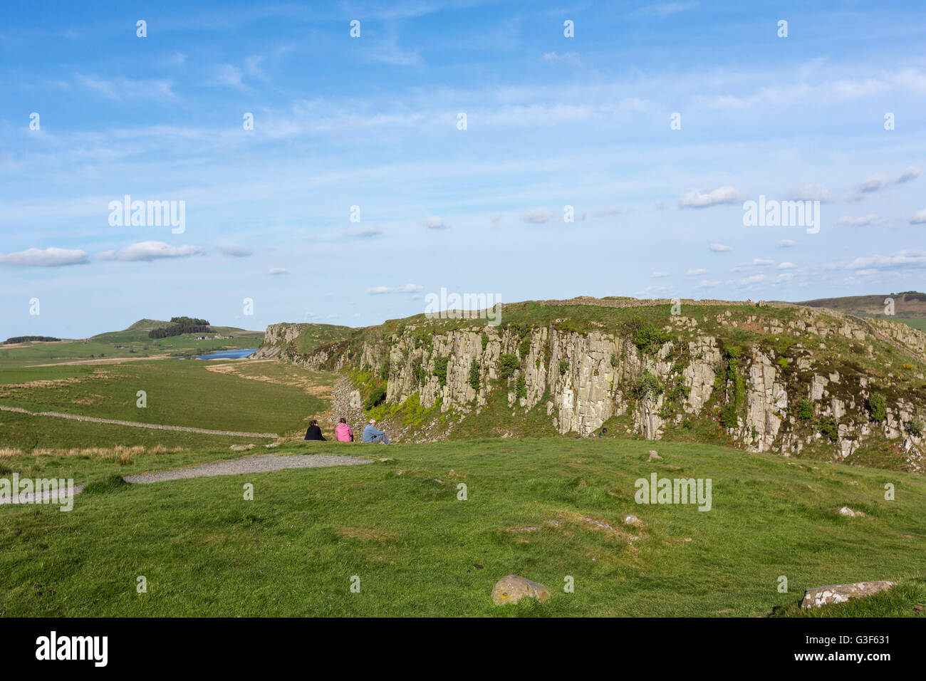 Tourists watching Steel Rigg, Hadrian's Wall near Crag Lough ...