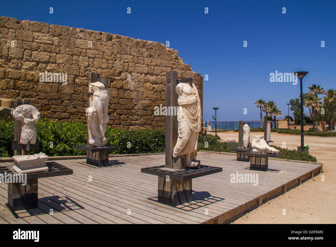 Ancient statues and marine artifacts in harbor of Caesarea National ...