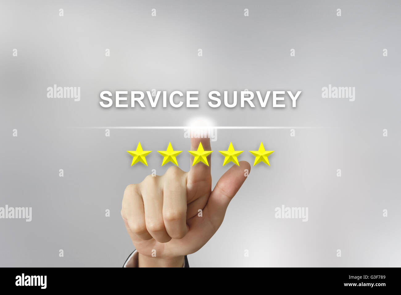 business hand clicking service survey with five stars on screen Stock ...