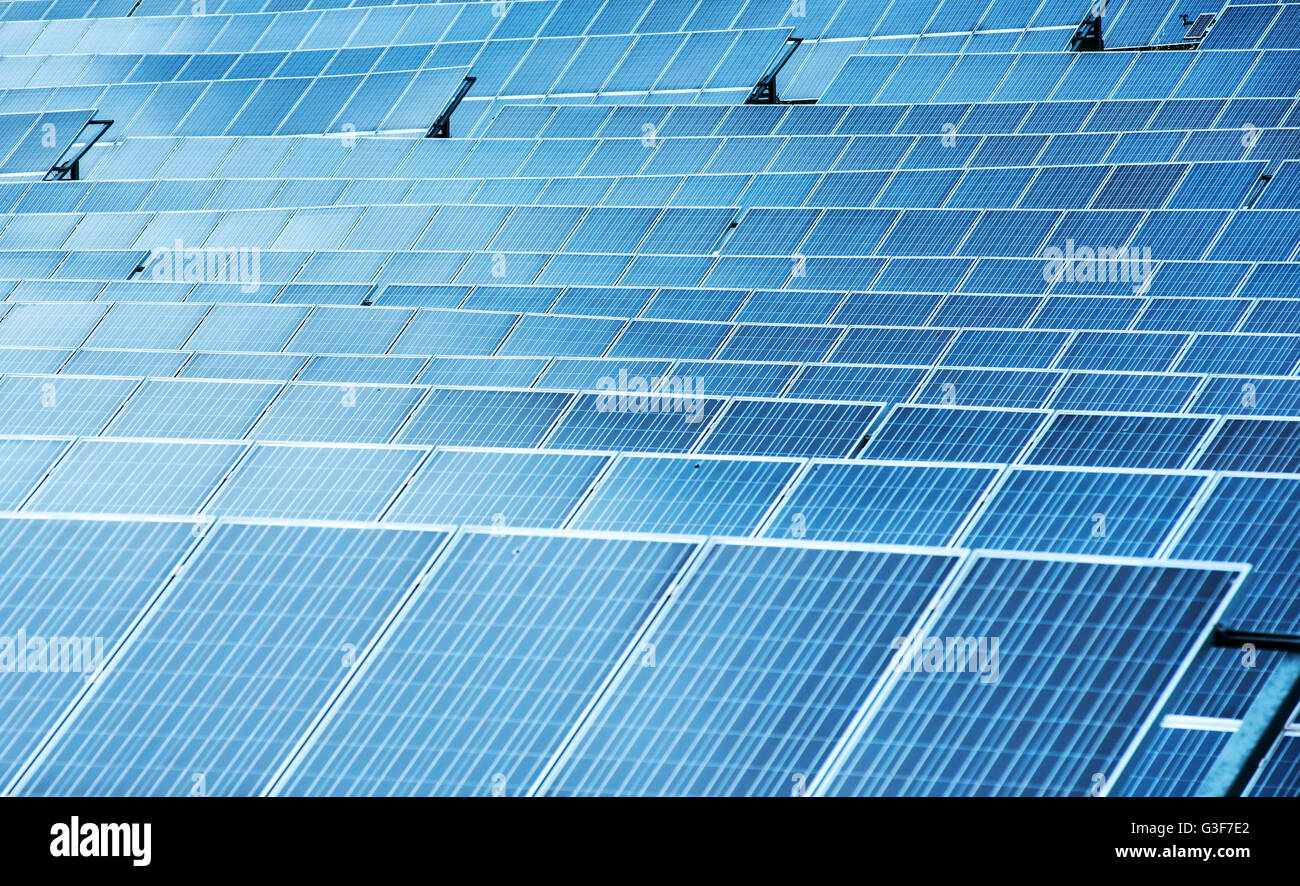 Photovoltaic solar panels in a close up full frame background view for ...