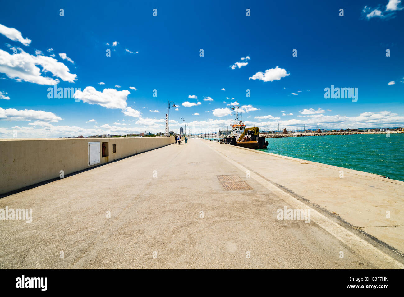 breakwater in the Adriatic Sea off the coast with ancient and modern ...