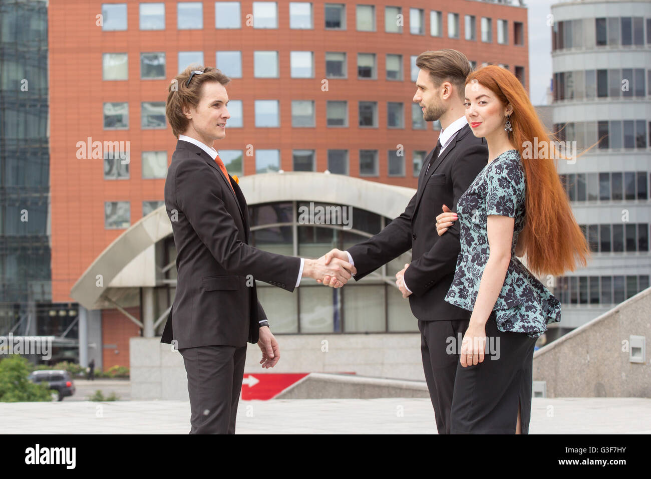 Meeting Handshake of two business men outdoors Stock Photo - Alamy