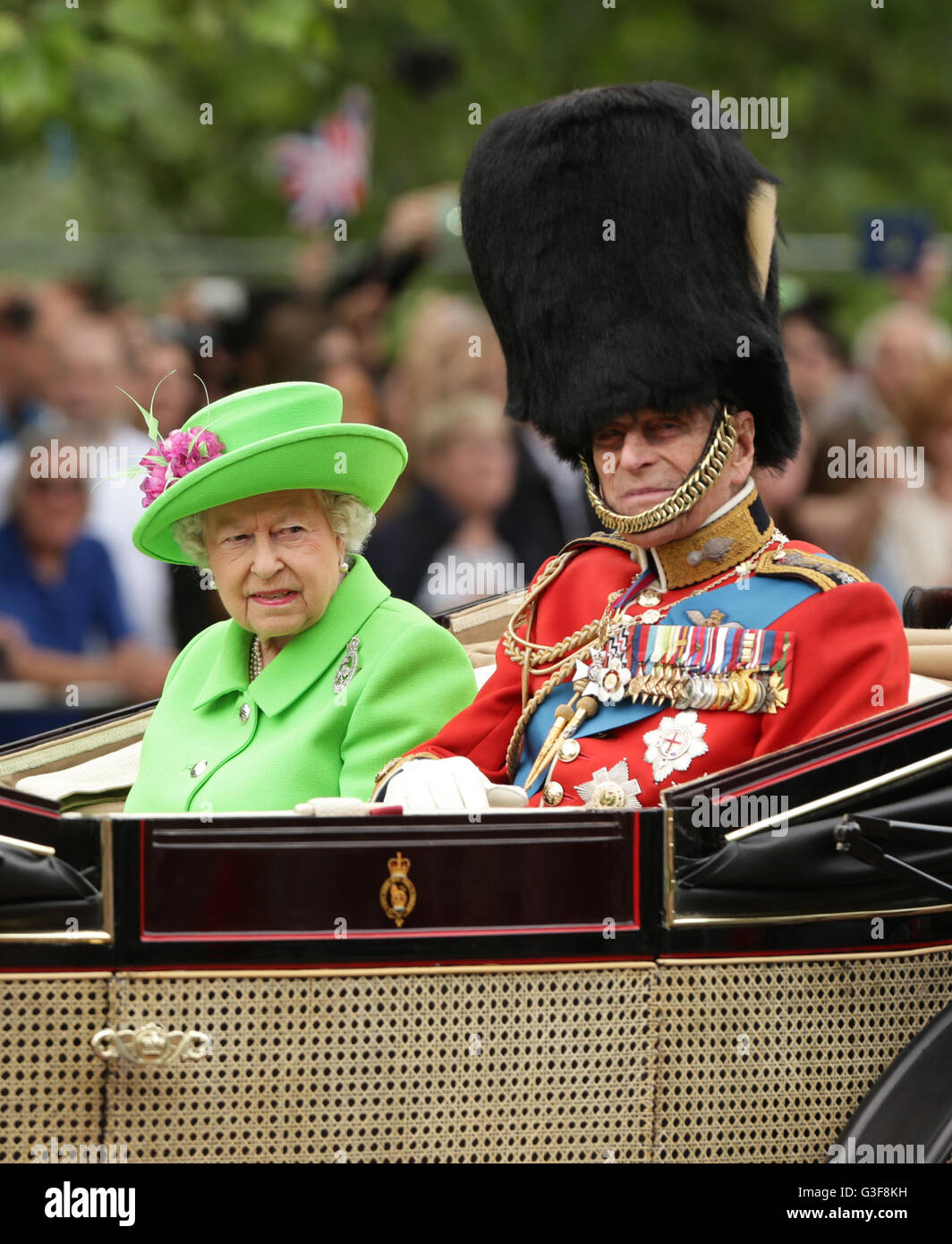 Queen Elizabeth II and the Duke of Edinburgh in a carriage as the royal ...