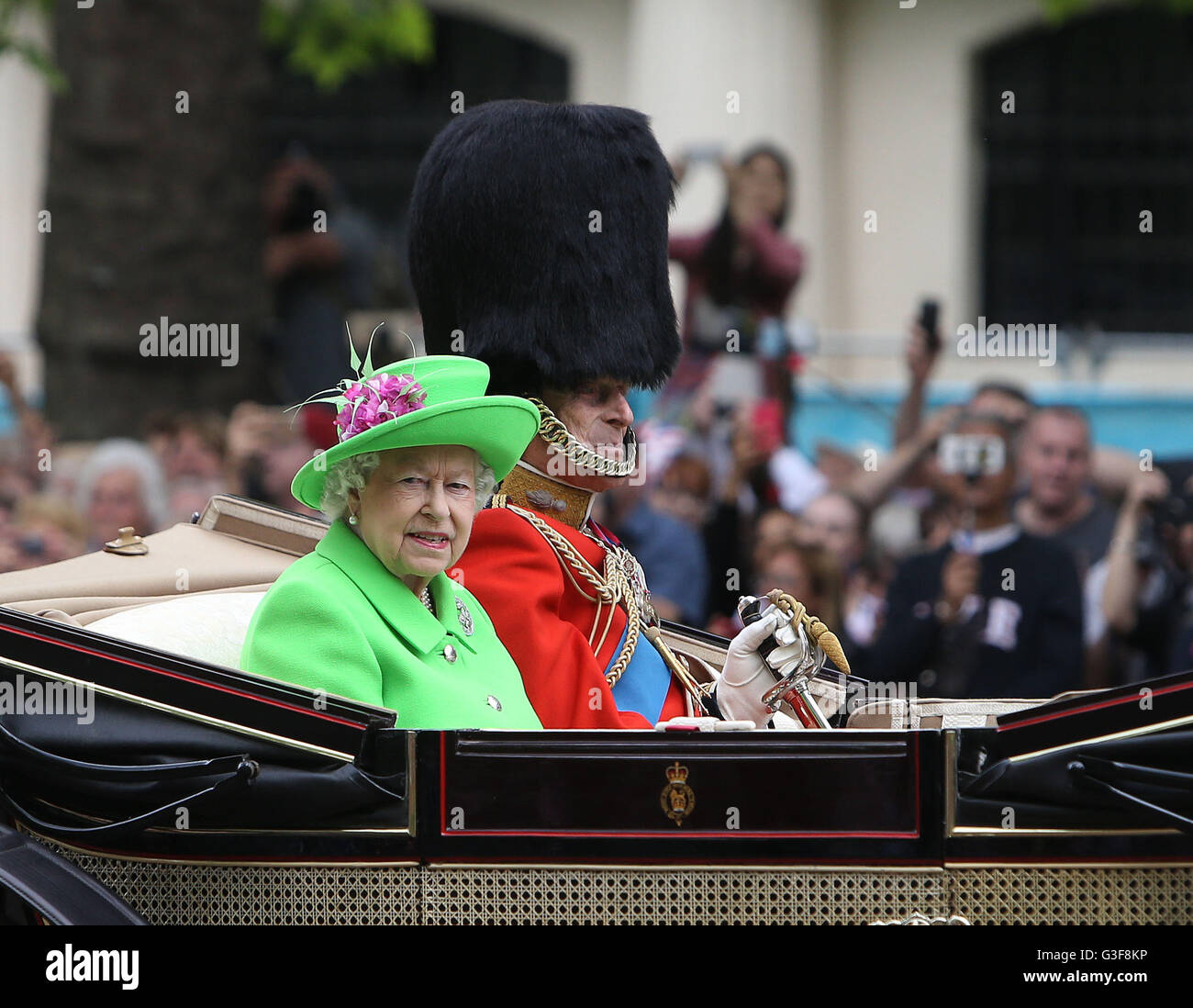 Queen Elizabeth II and the Duke of Edinburgh as the royal procession ...