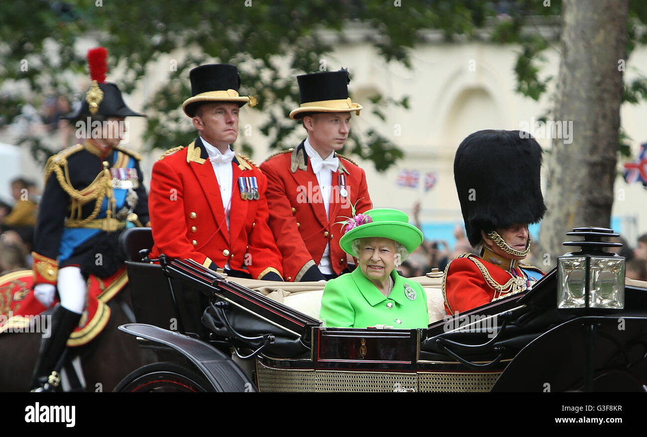 Queen Elizabeth II and the Duke of Edinburgh as the royal procession ...