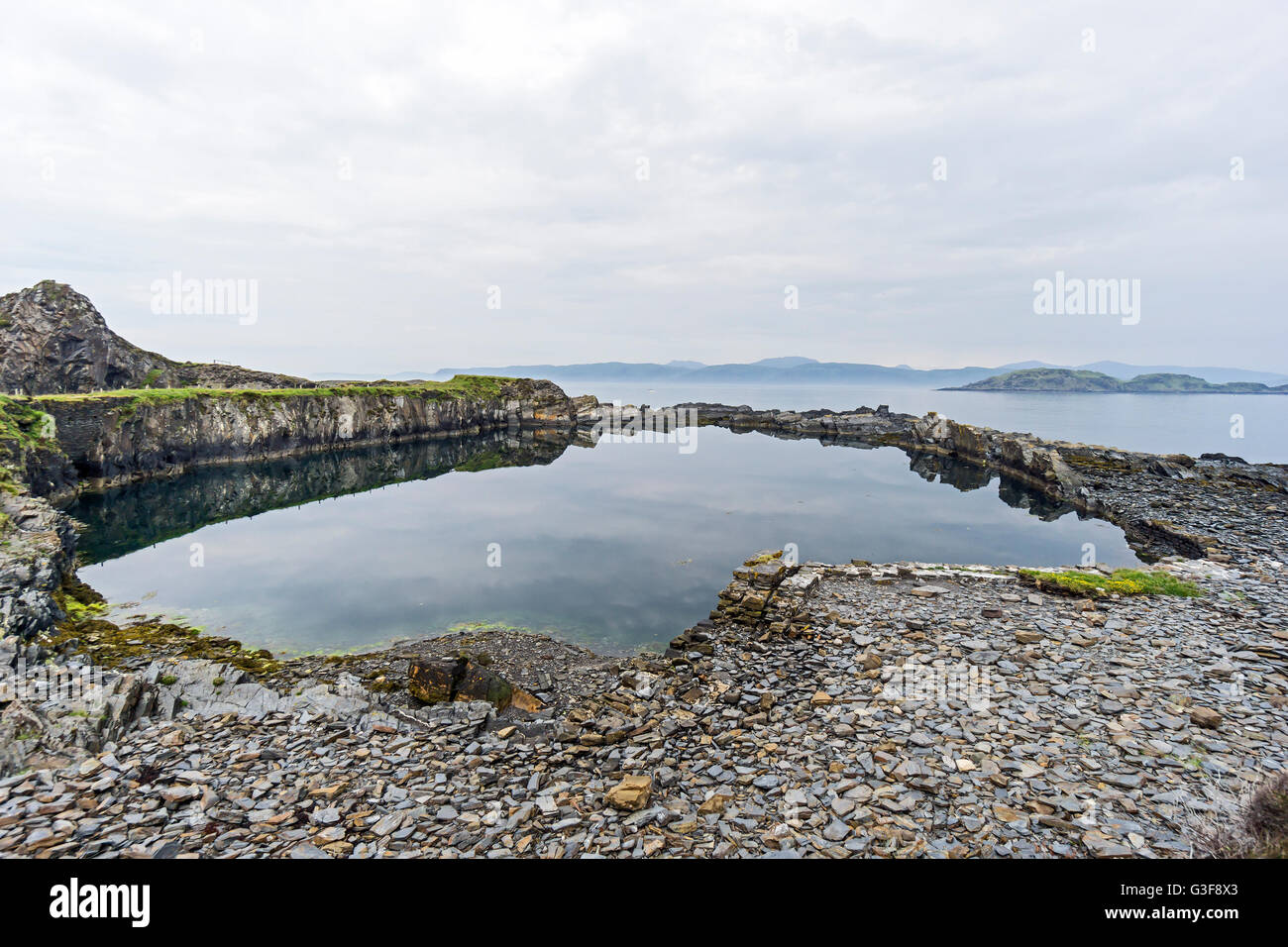 Disused slate quarry on the island of Easdale south of Oban in Scotland ...