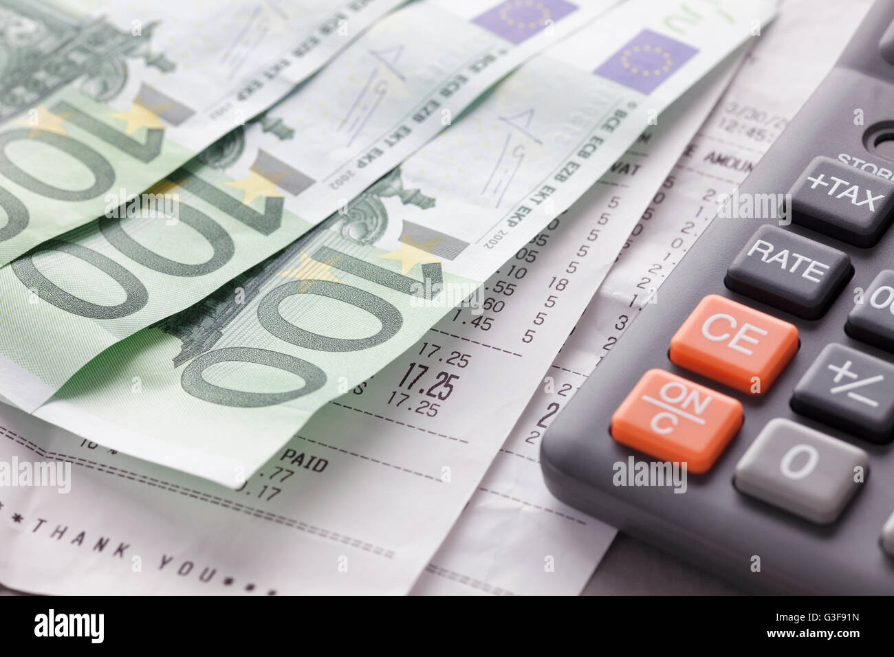 Calculator with Euro notes and receipts. Finance concept. Closeup Stock ...