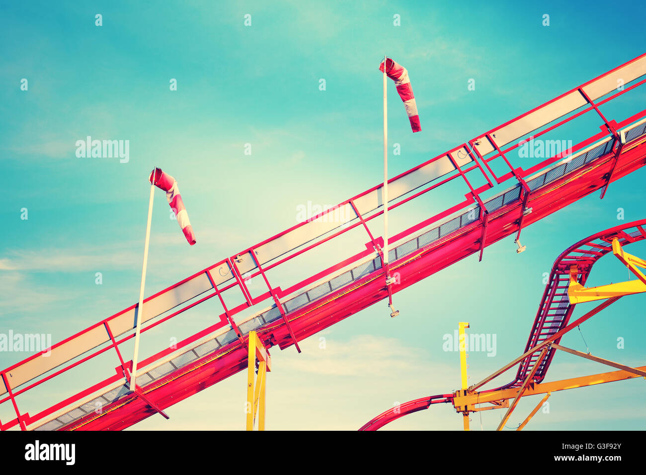 Retro toned picture of roller coaster rails Stock Photo - Alamy