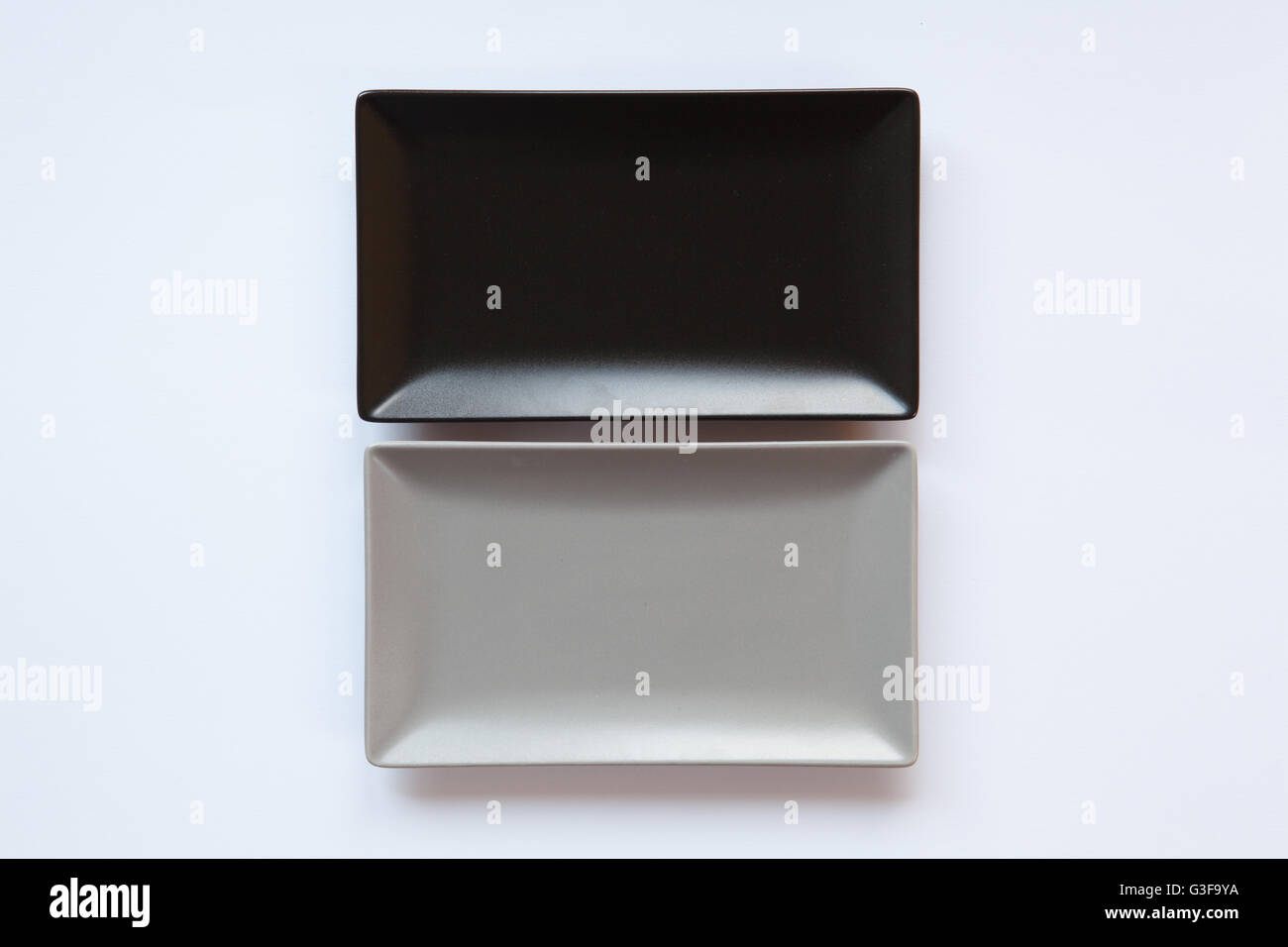 Different ceramic dishes on over white background, rectangle dish Stock ...