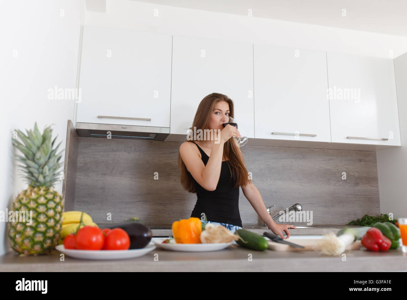 Beautiful lady cooking in kitchen hi-res stock photography and images ...