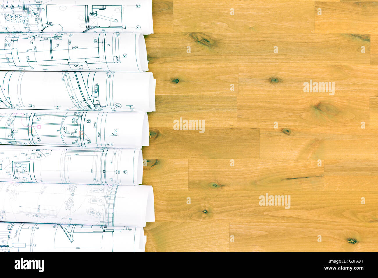 stack of rolled construction plans and technical drawings Stock Photo ...