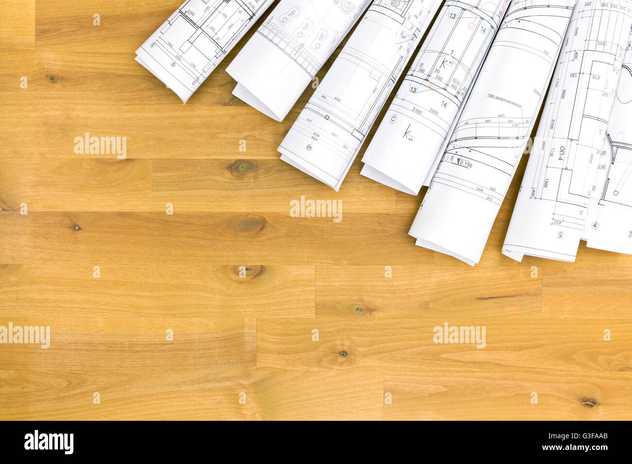 architect's workspace with rolled blueprints and house plans Stock ...