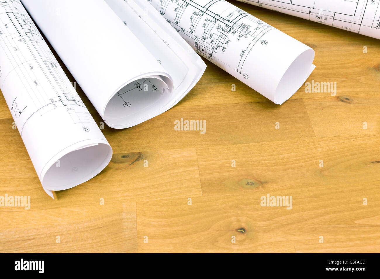 architect's workspace with rolled blueprints and house plans Stock ...