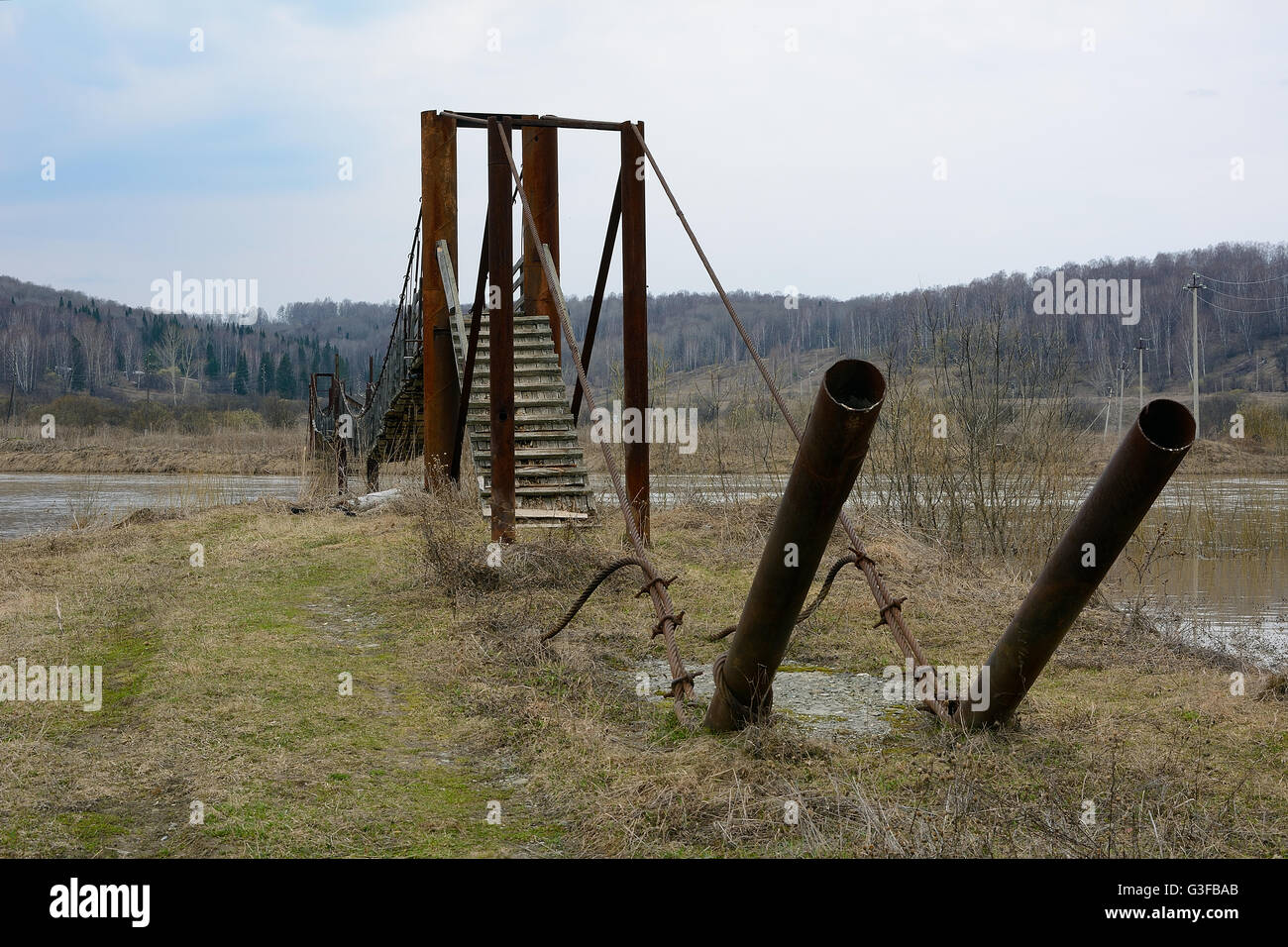 Suspended pedestrian bridge over the river Berd, in the village of ...