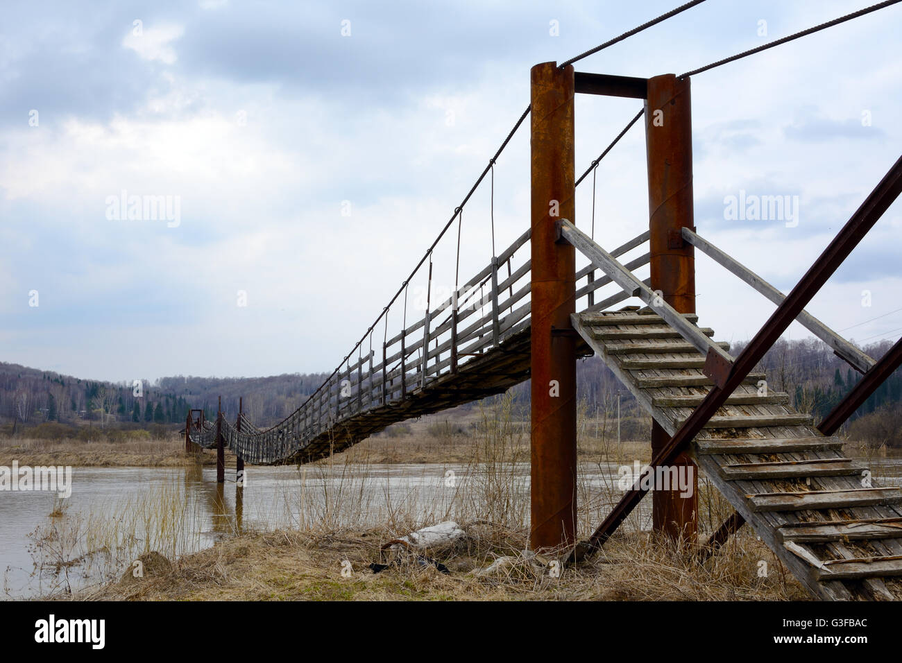 Suspended pedestrian bridge over the river Berd, in the village of ...