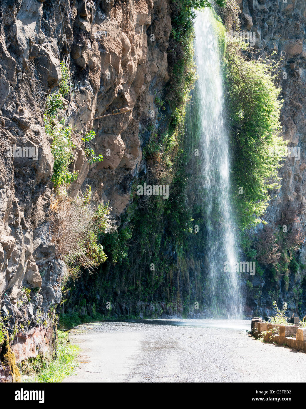 waterfall in nature on portuguese island of madeira road near calheta ...