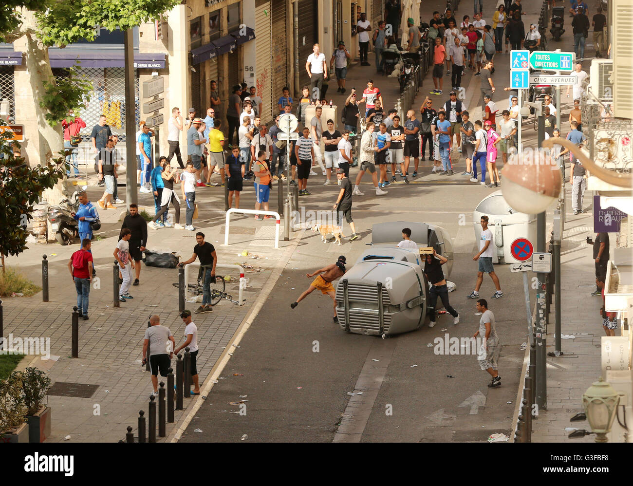 Football fans knock over bins hi-res stock photography and images - Alamy
