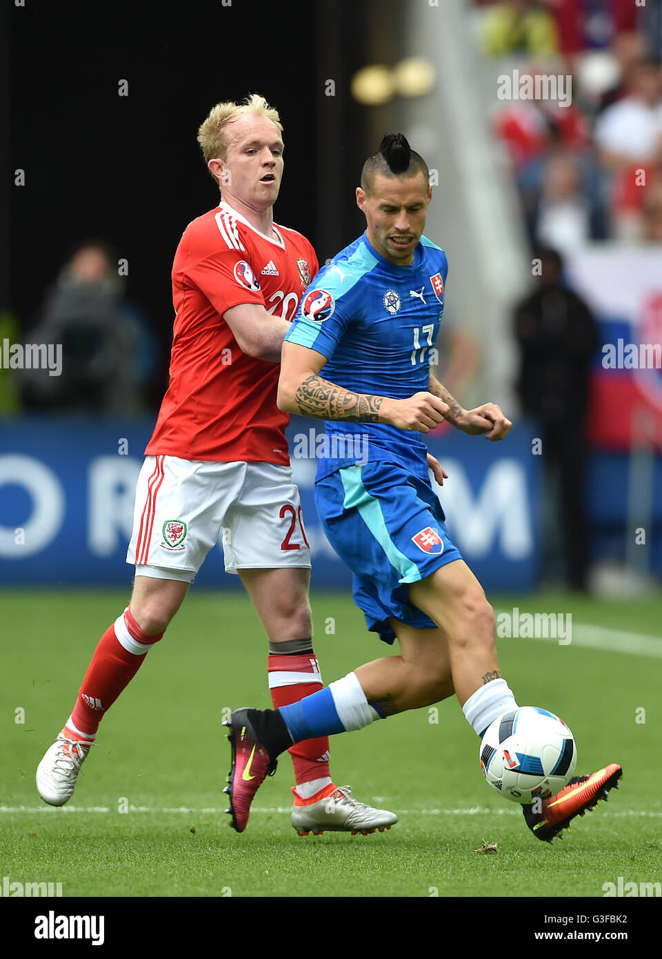 Wales Jonathan Williams (left) and Slovakia's Marek Hamsik battle for ...