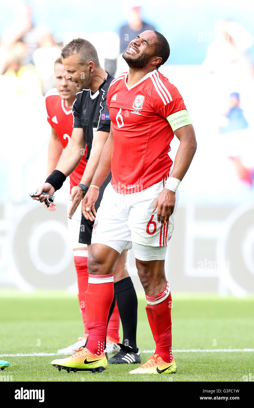 Wales' Ashley Williams reacts after suffering an injury during the UEFA ...