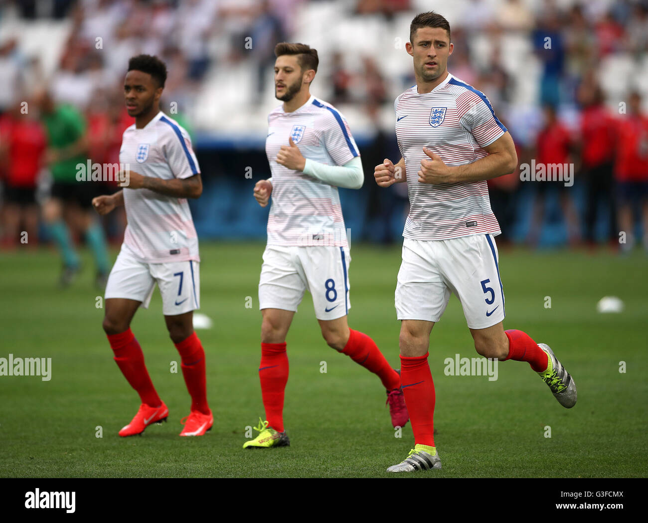 England's Gary Cahill (right), Adam Lallana (centre) and Raheem ...