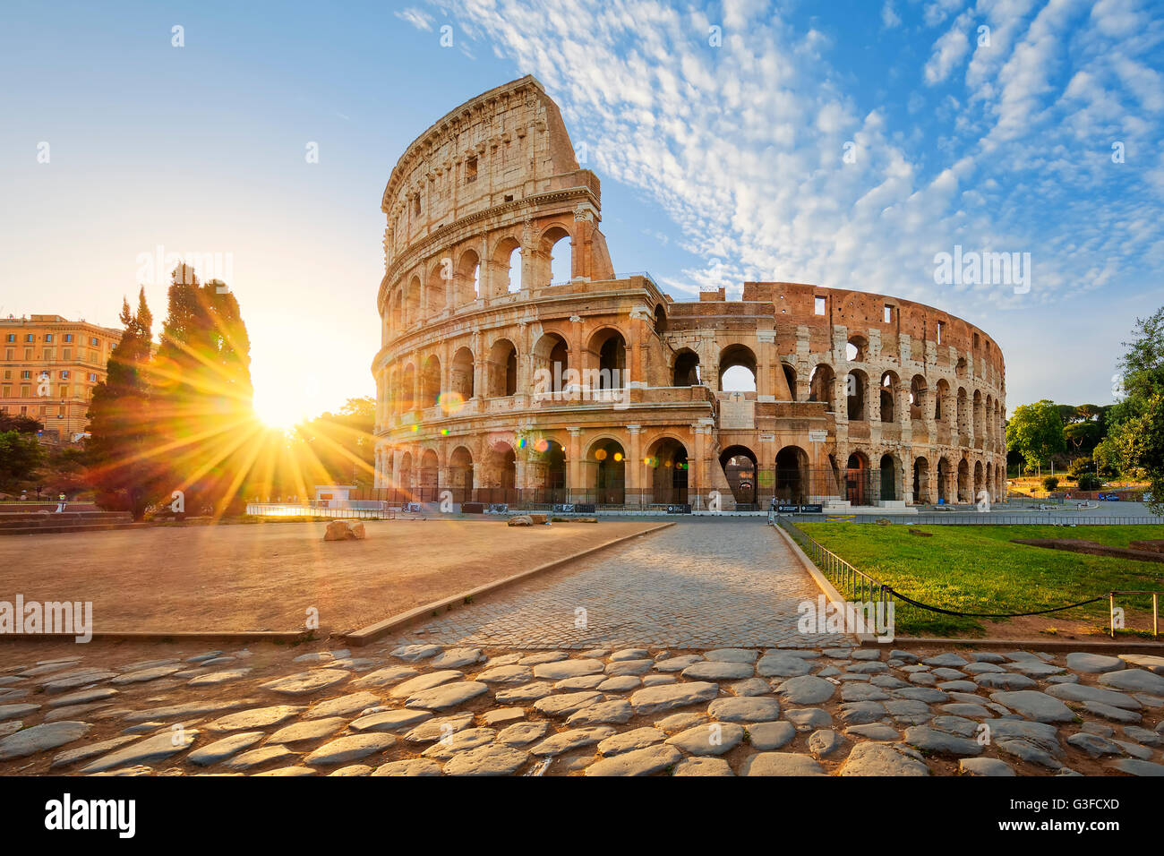 View of Colosseum in Rome and morning sun, Italy, Europe Stock Photo ...