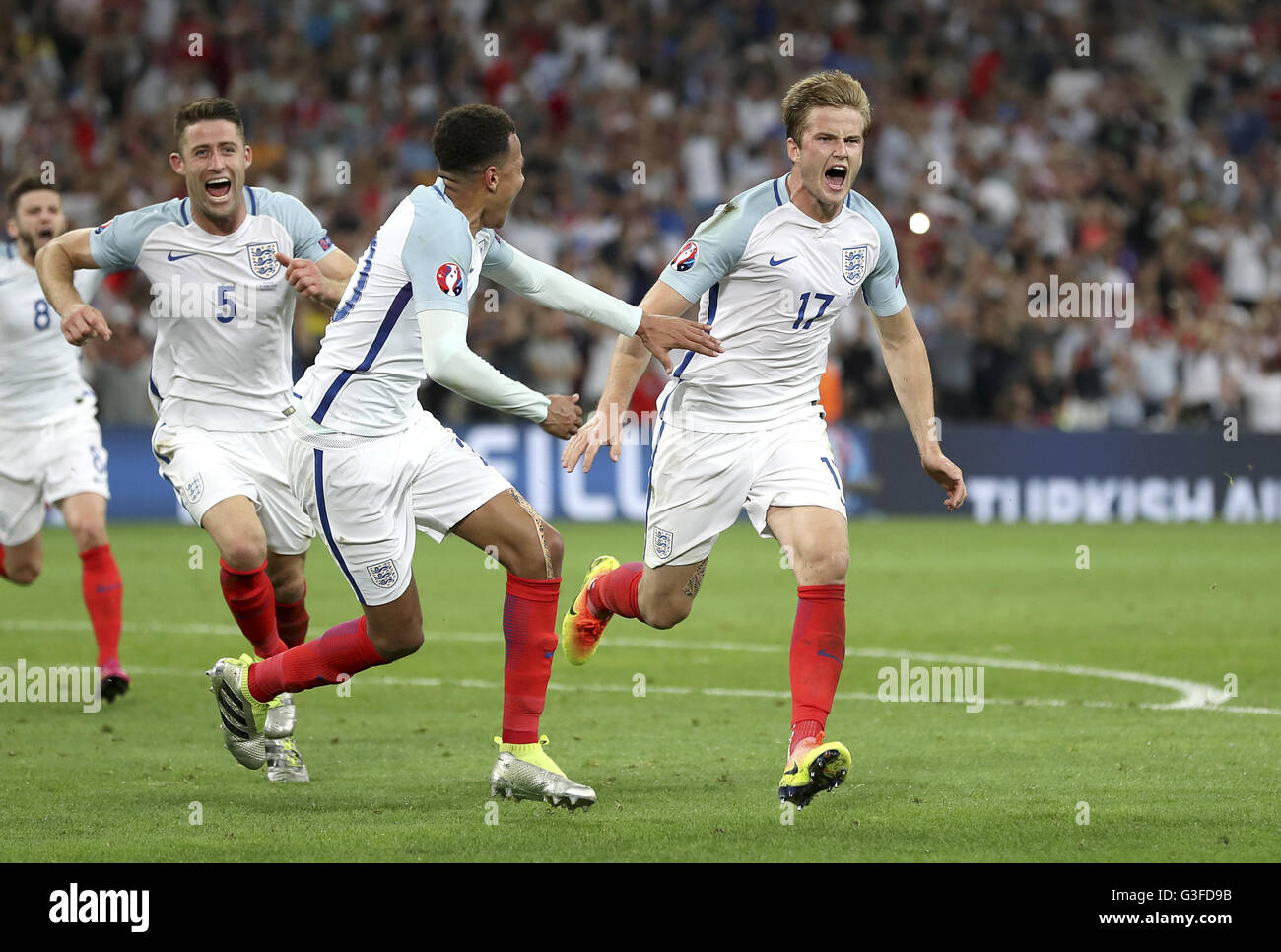 England's Eric Dier celebrates scoring their first goal of the game ...