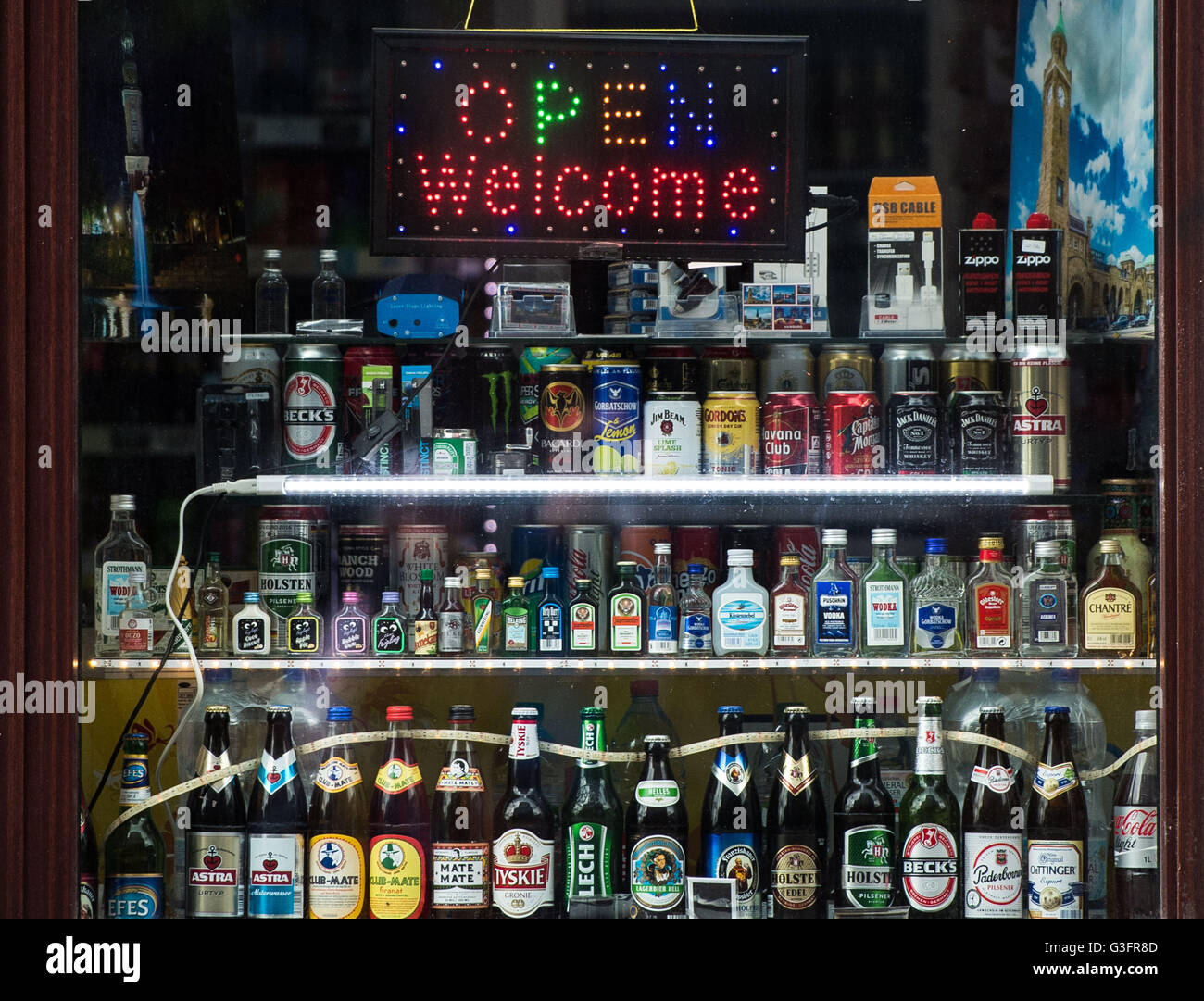 An illuminated panel with the words 'Open Welcome' and lots of ...